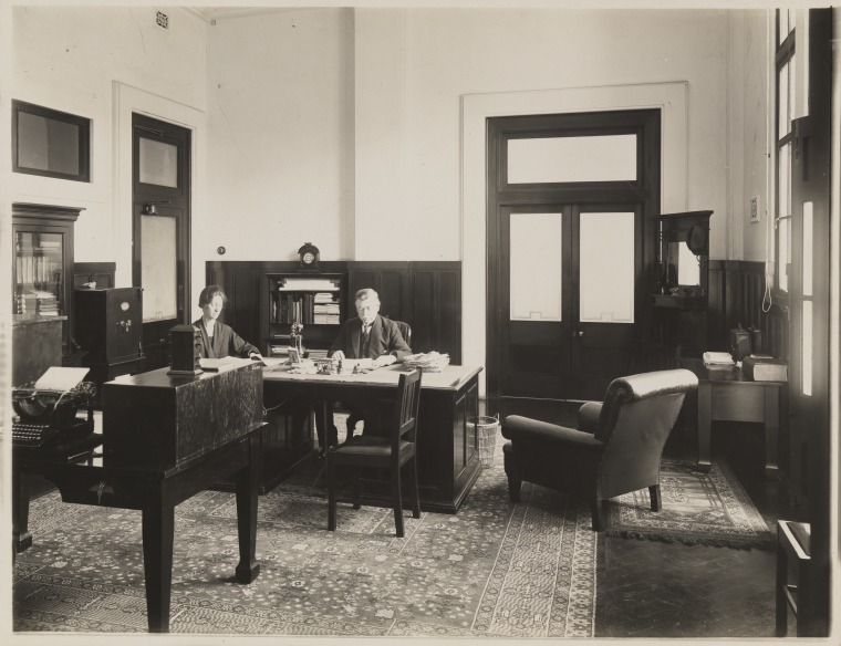 J.J. Lloyd, Deputy Postmaster General for W.A., in his office. - JPG ...