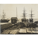 Rockingham jetty showing timber being loaded on ships