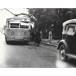 A woman boards trolley bus No. 2, route 1 to Kensington Street, East Perth.