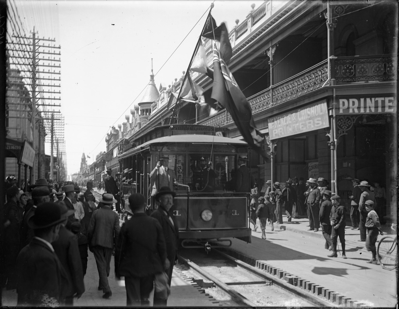 Trams decorated with flags for the opening of the Fremantle Municipal ...