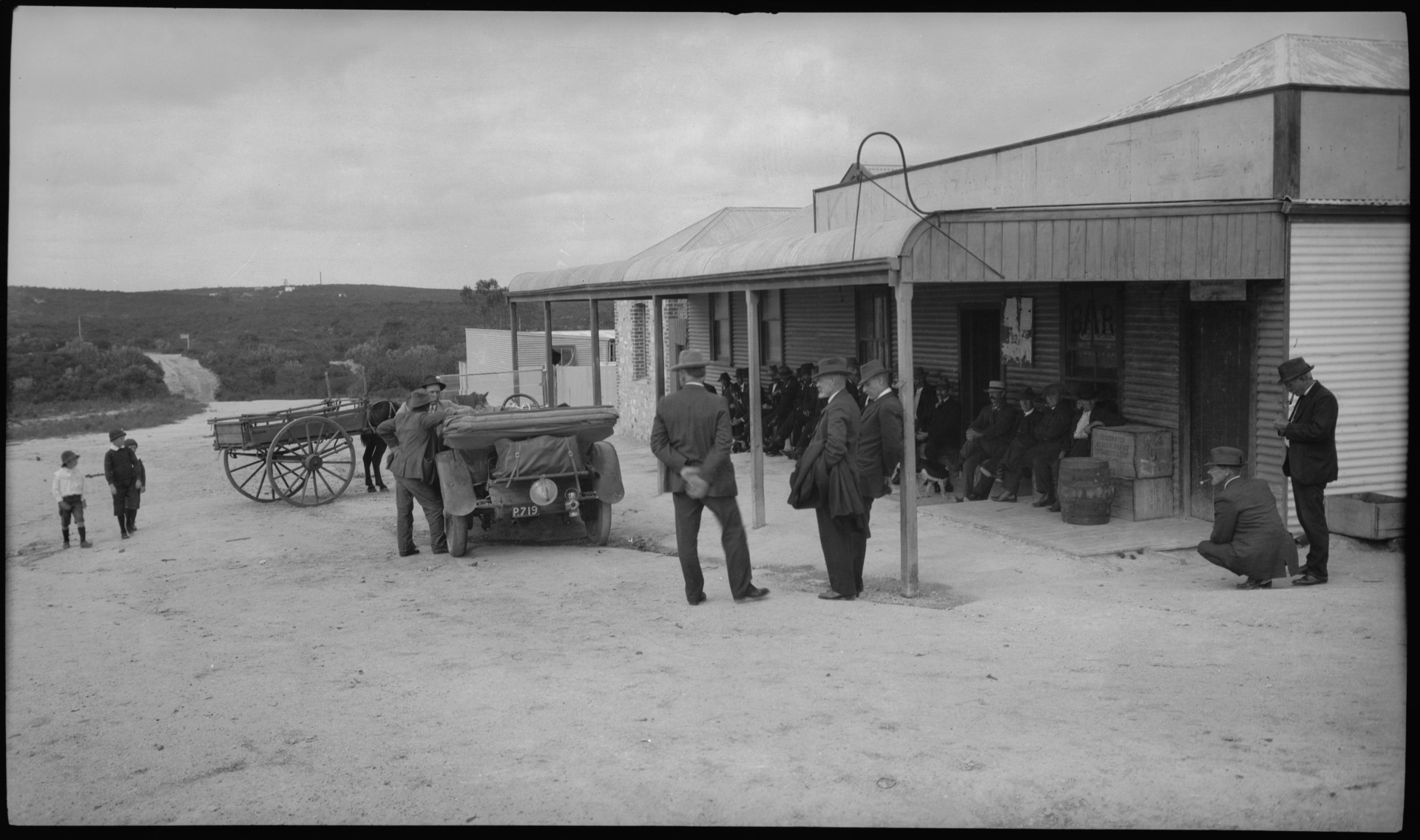 Locals wait outside Kundip Hotel to welcome Premier Scaddan - JPG 382.2 KB