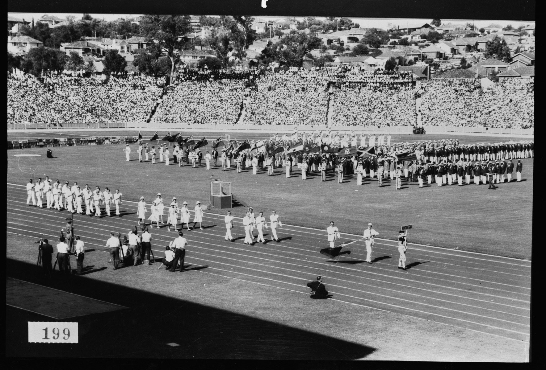 The team from Rhodesia marches onto Perry Lakes Stadium at the opening ...