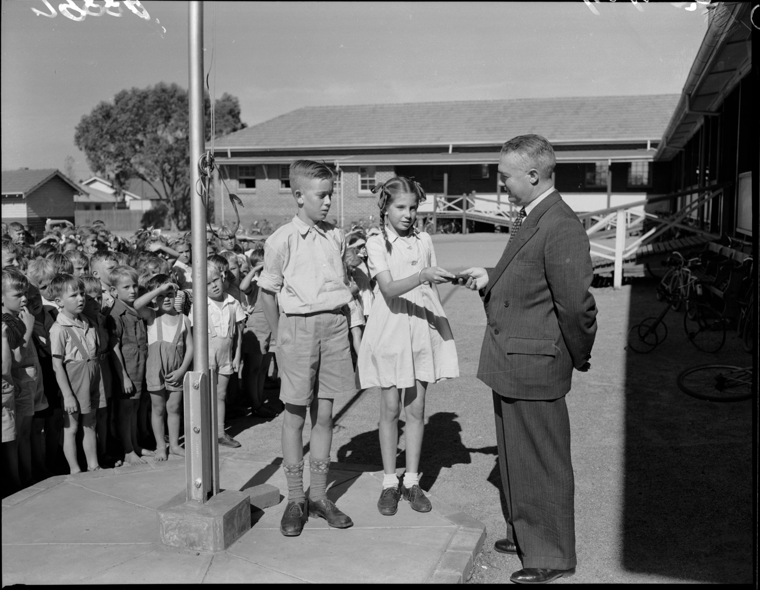 Mr G. Dunstan receives money for the Red Cross Appeal from Noel ...