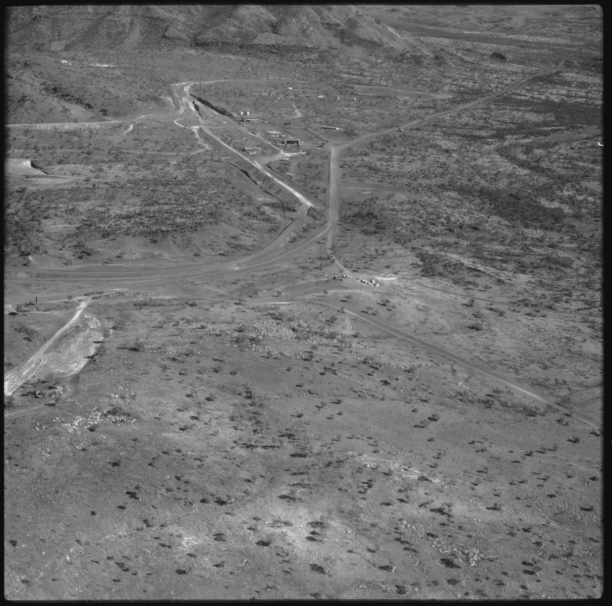 Aerial photographs of the construction of the iron mine at Mt Tom Price ...