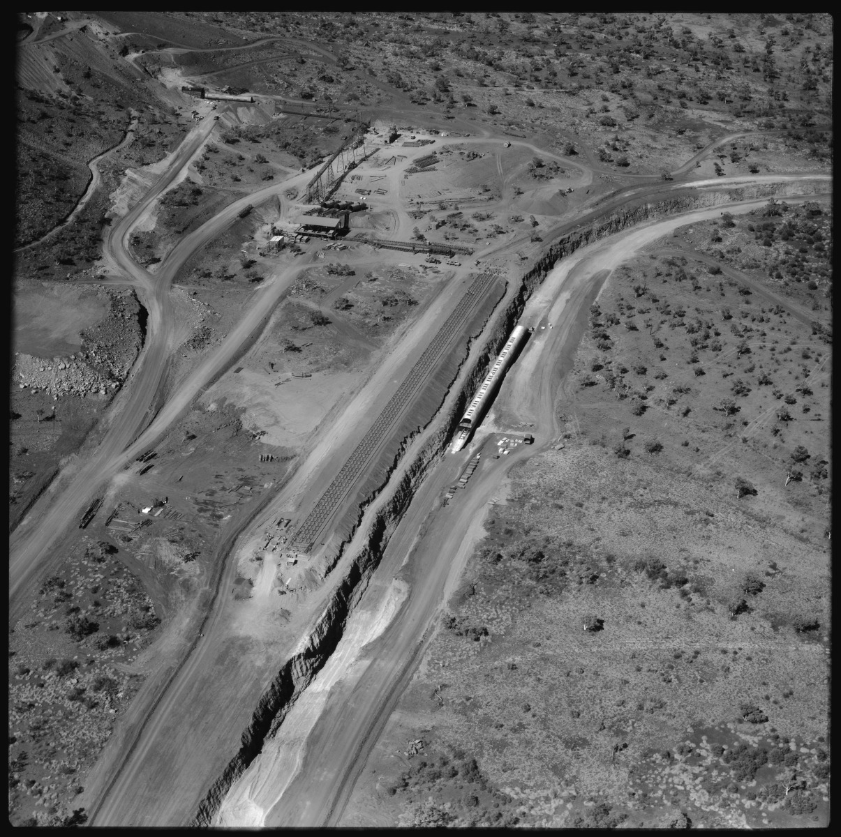 Aerial photographs of the construction of the iron mine at Mt Tom Price ...