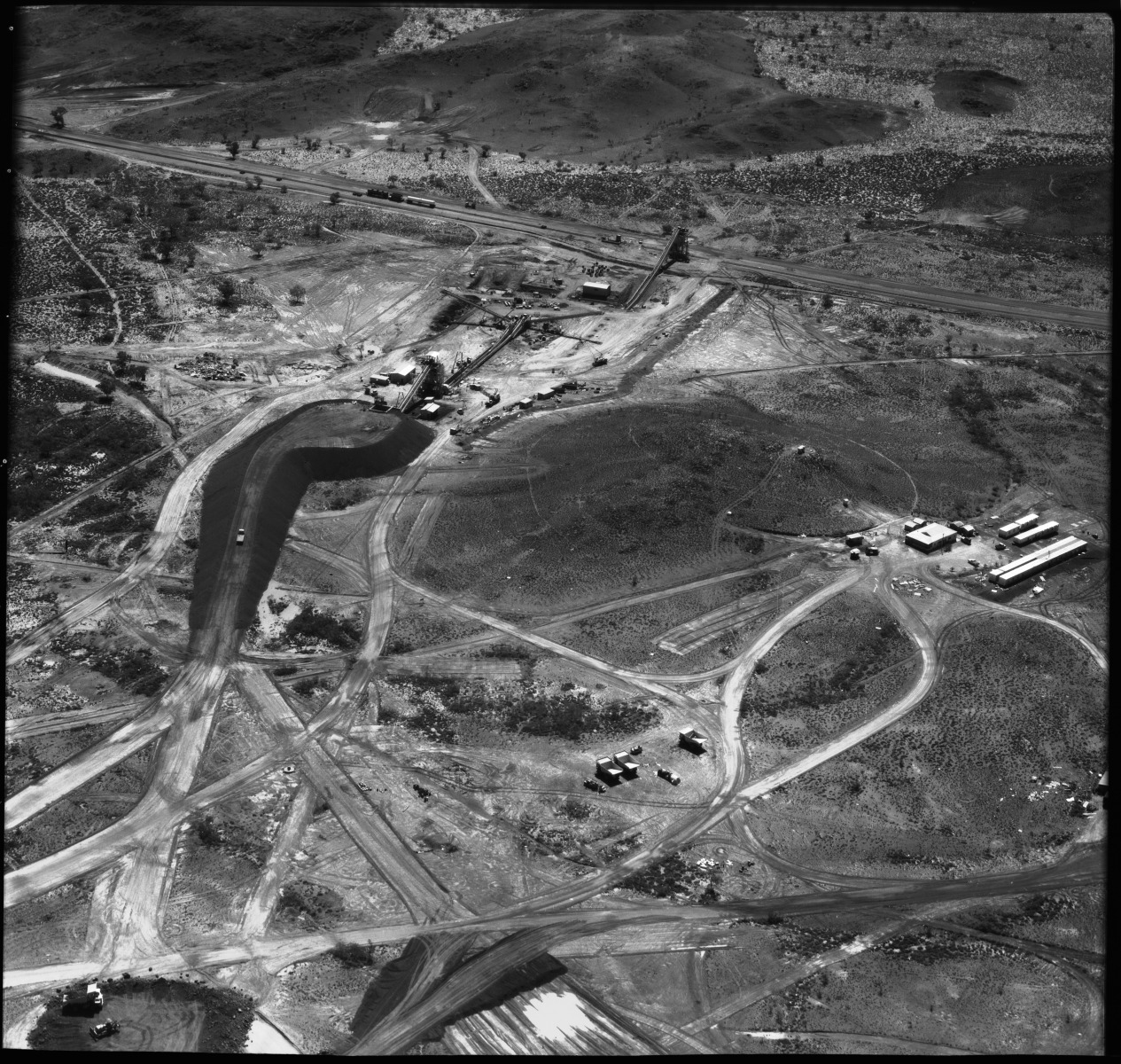 Aerial photographs of the construction of the iron mine at Mt ...