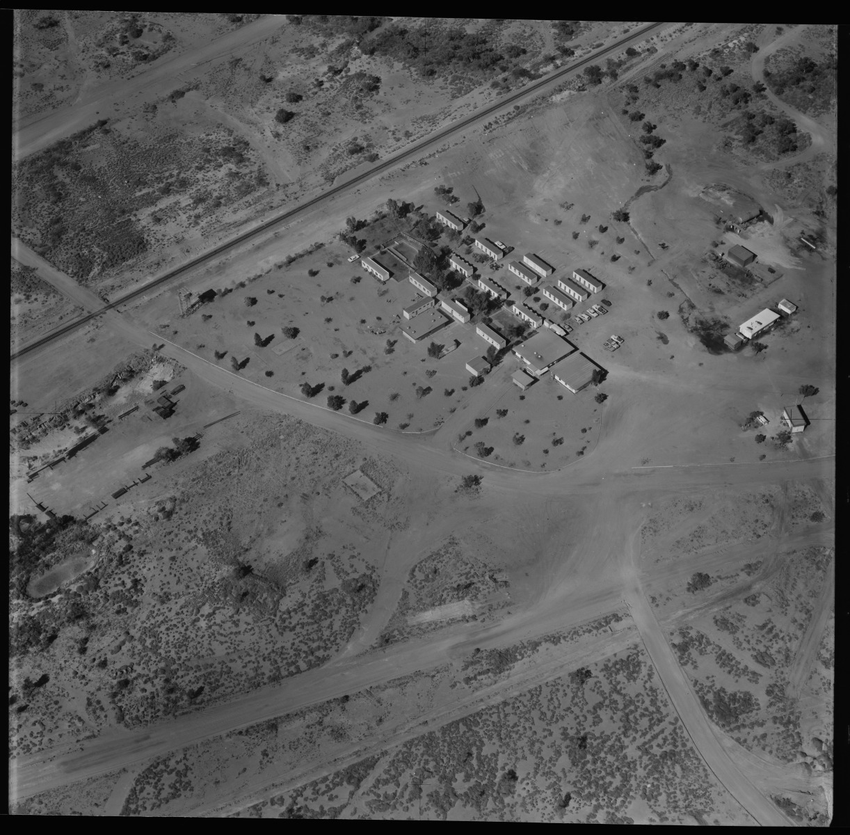 Aerial photographs of the Mt Newman Iron Ore Railroad line camps Cowra ...
