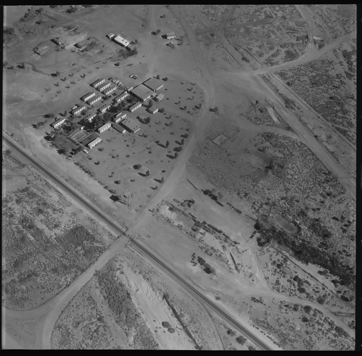 Aerial photographs of the Mt Newman Iron Ore Railroad line camps Cowra ...