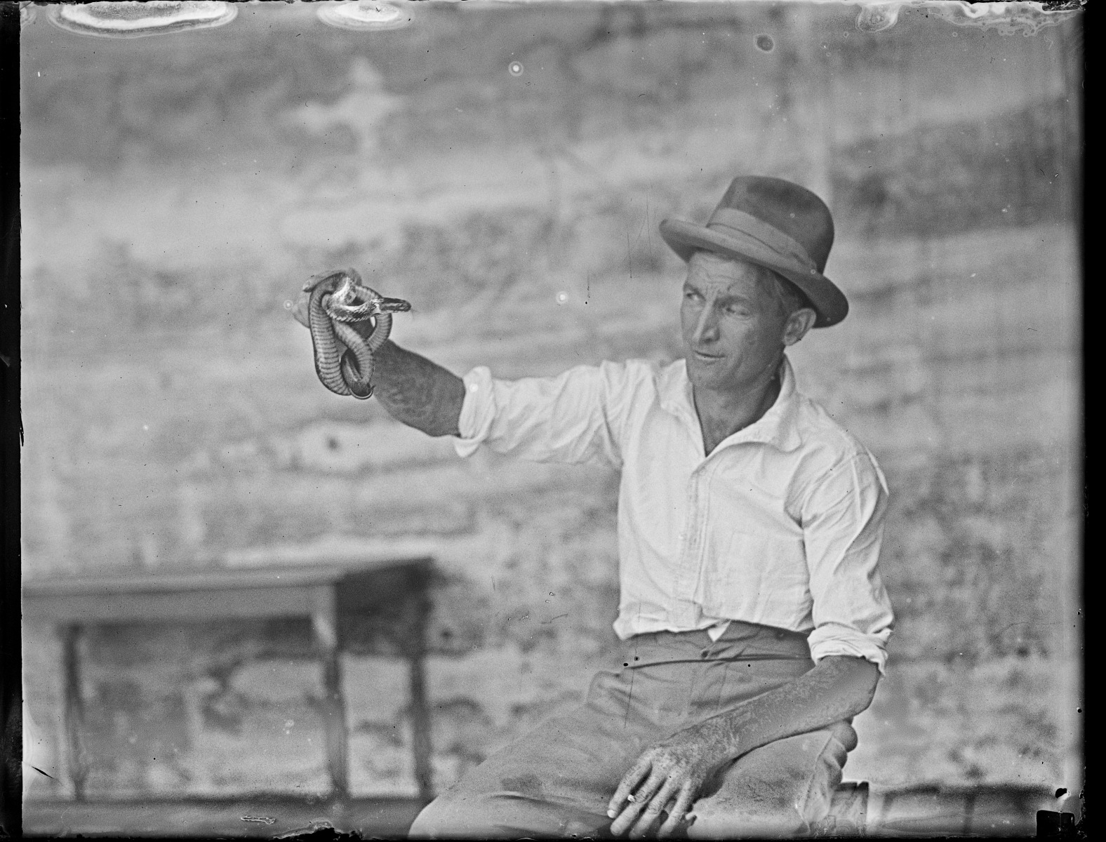 rocky-vane-snake-handler-state-library-of-western-australia