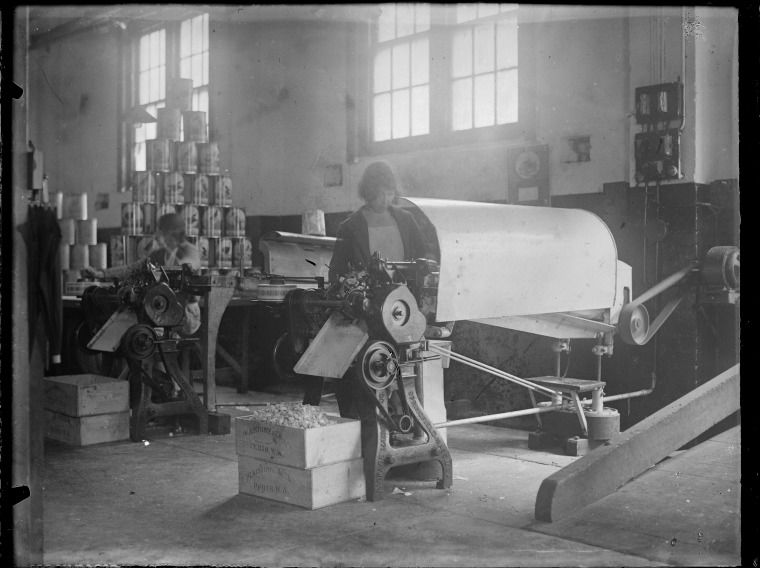 The caramel wrapping machine at Plaistowe's confectionery factory, West ...