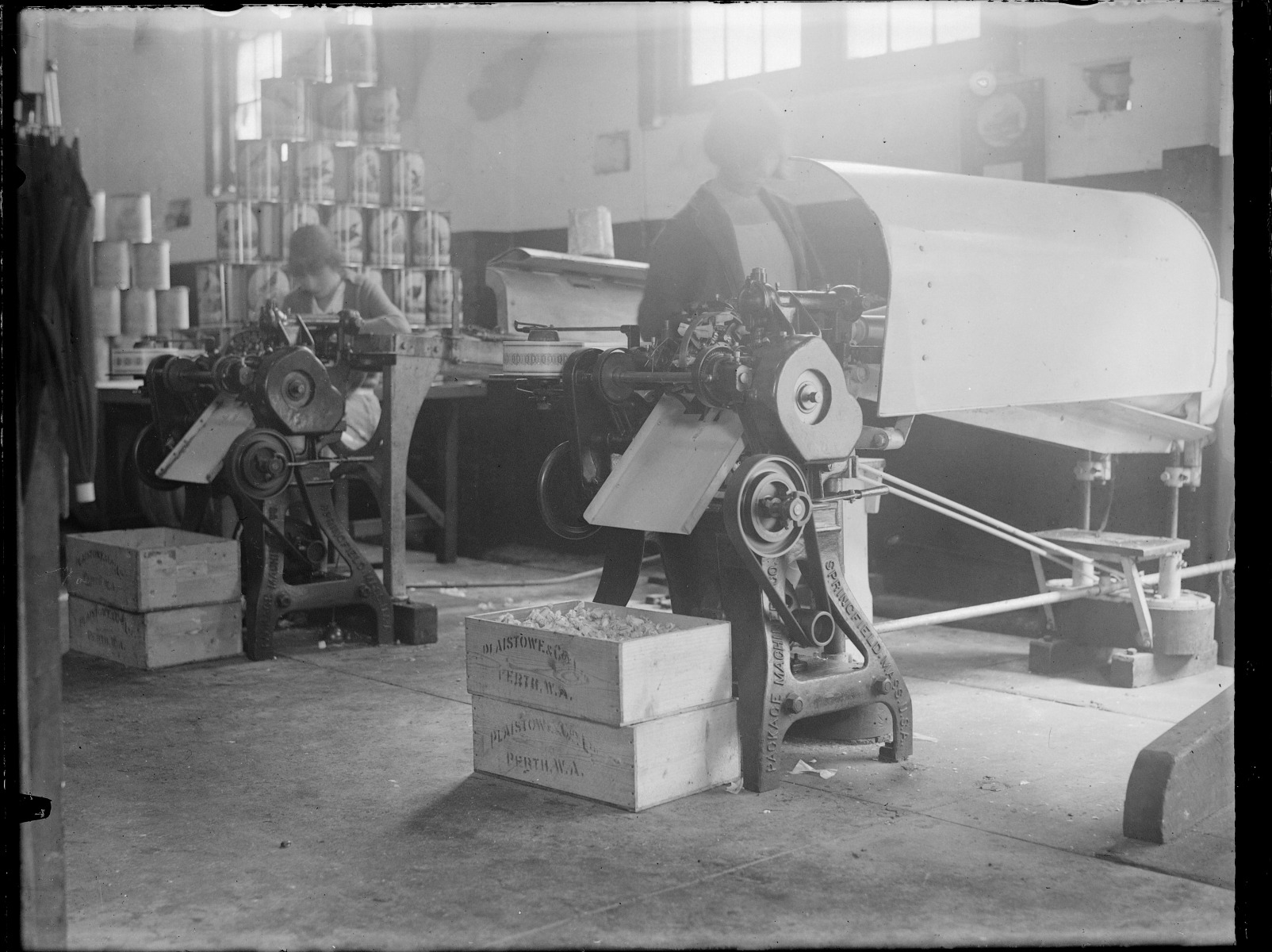 The caramel wrapping machine at Plaistowe's confectionery factory, West ...