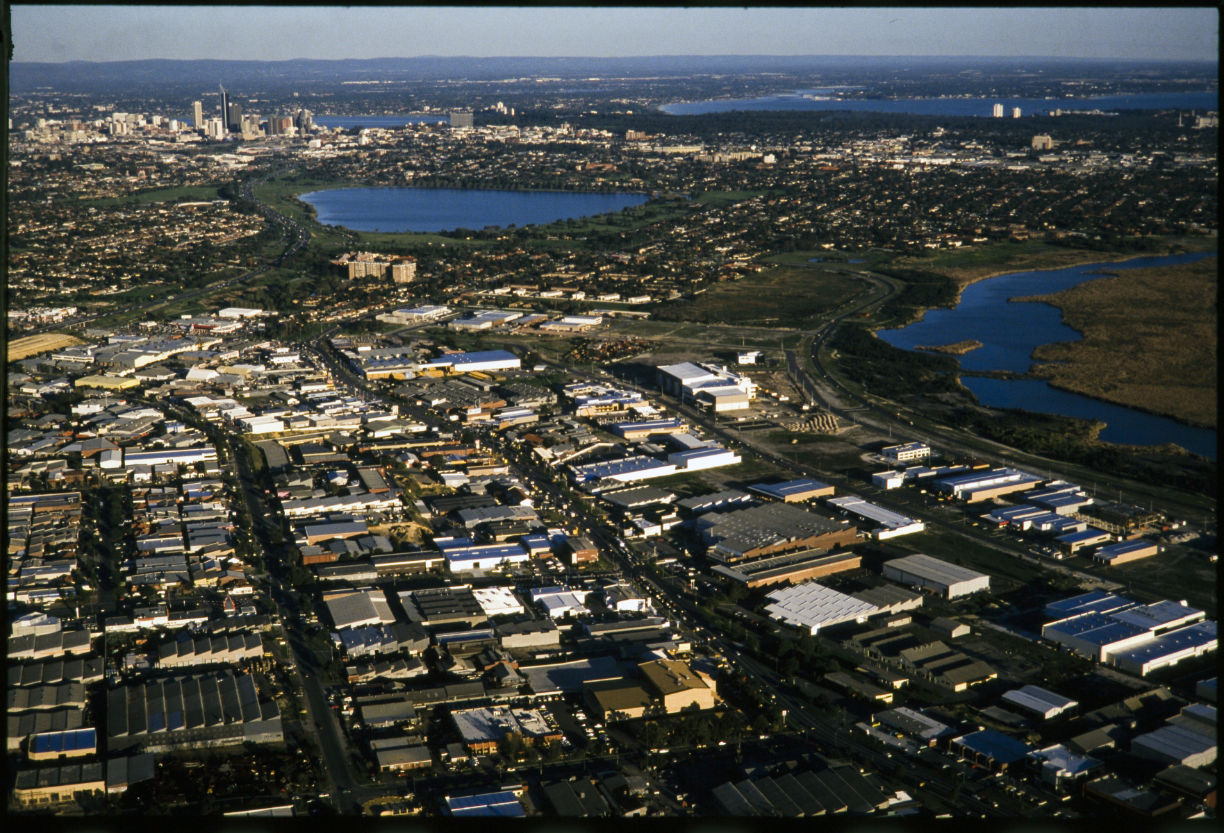 Aerial photograph of industrial area in Osborne Park with Perth in ...