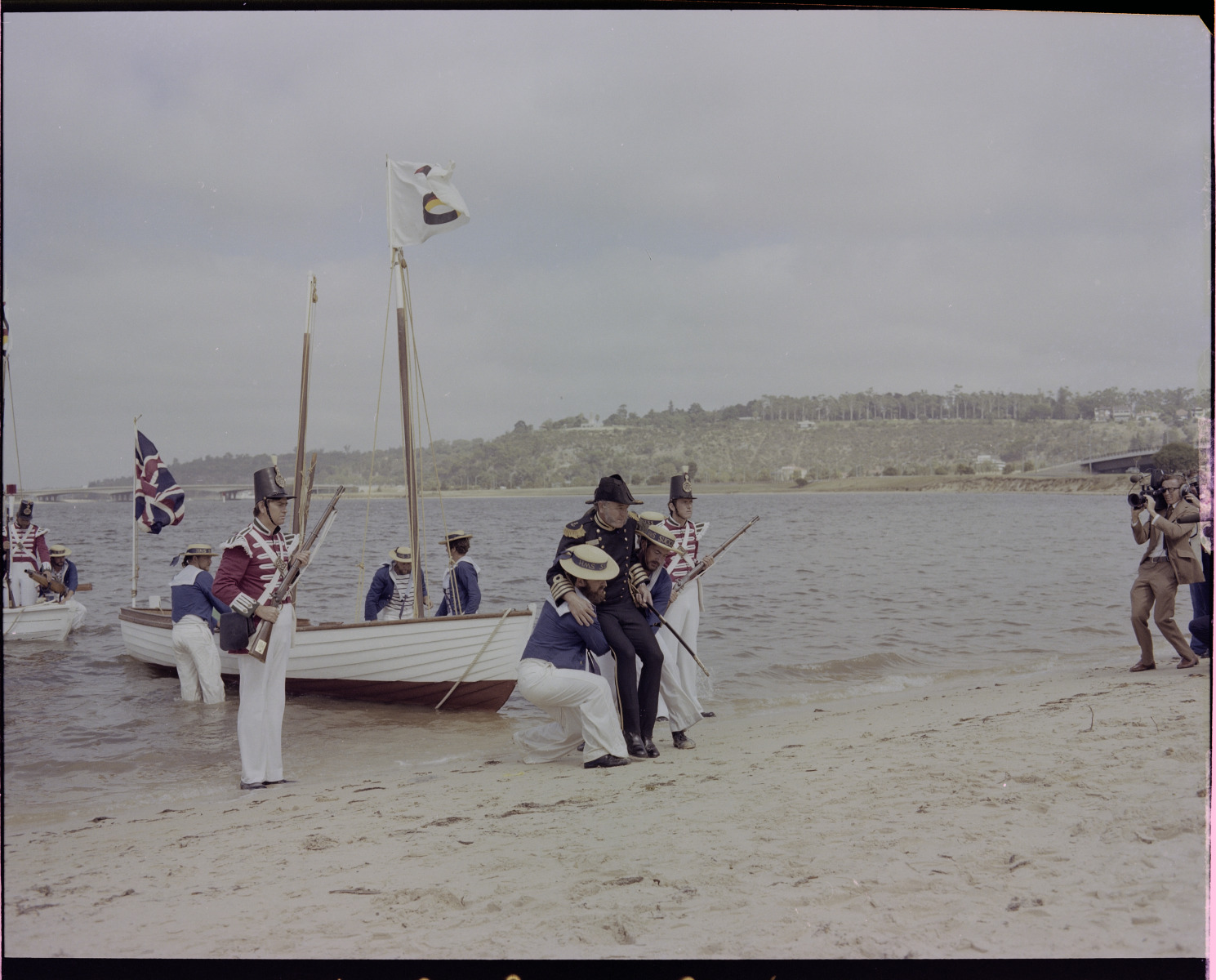 Prince Charles views a re-enactment of the landing of Captain James ...
