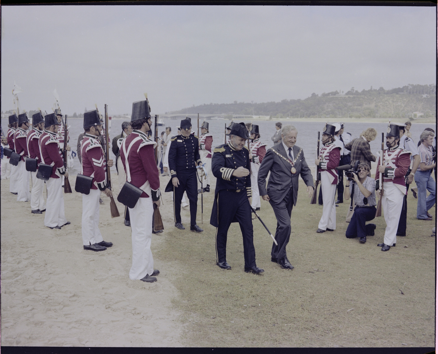 Prince Charles views a re-enactment of the landing of Captain James ...