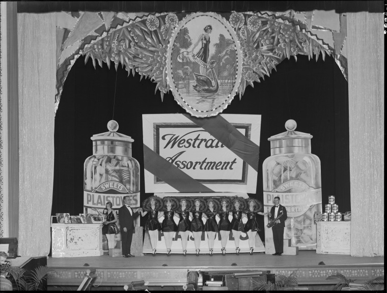 Tableaux advertising Plaistowe's confectionery on the stage of the ...