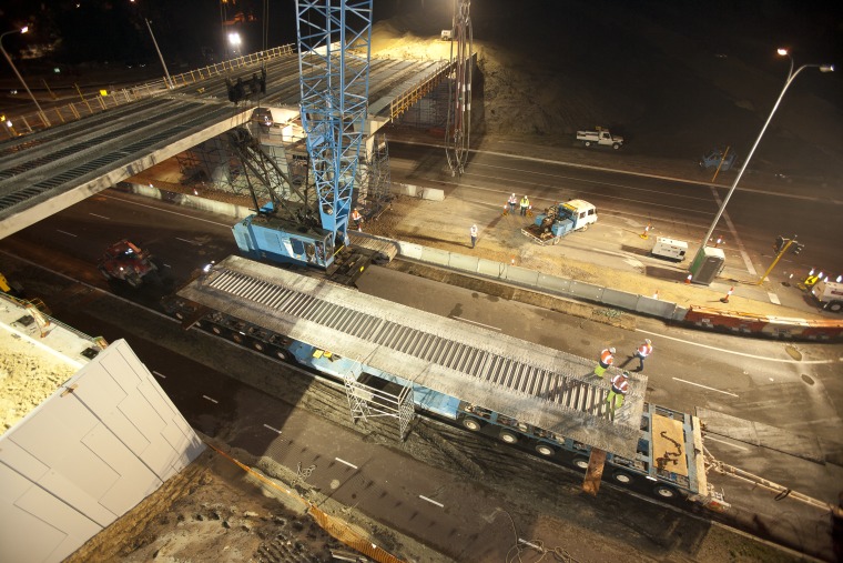 Lifting the spans into place on the Roe Highway South Street bridge, 4 ...