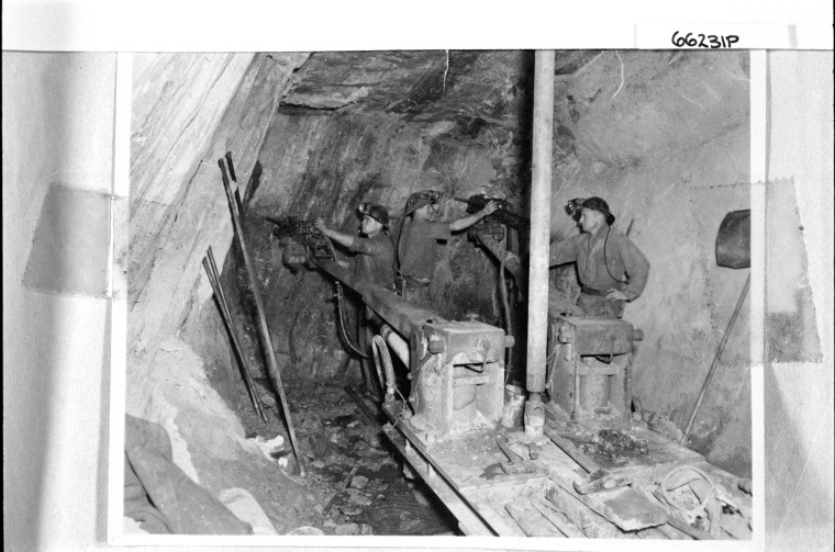 Hydraulic jumbo drill in operation at Big Bell Gold Mine. - JPG 115.6 KB