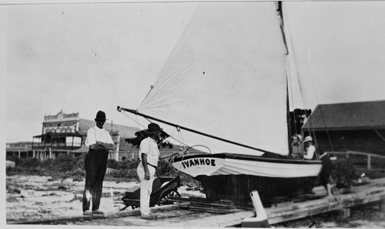 Sailing boat Ivanhoe on slipway with Soldiers Institute building in ...