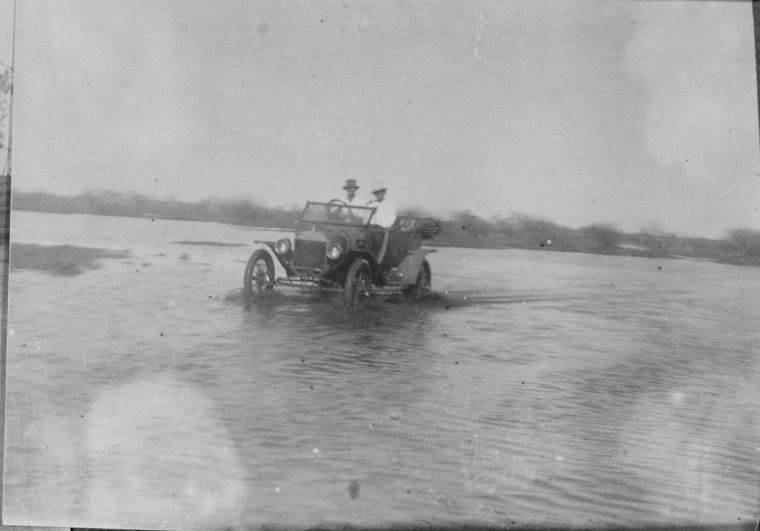 Driving through flooded sections of Minderoo Station, January 1915 ...