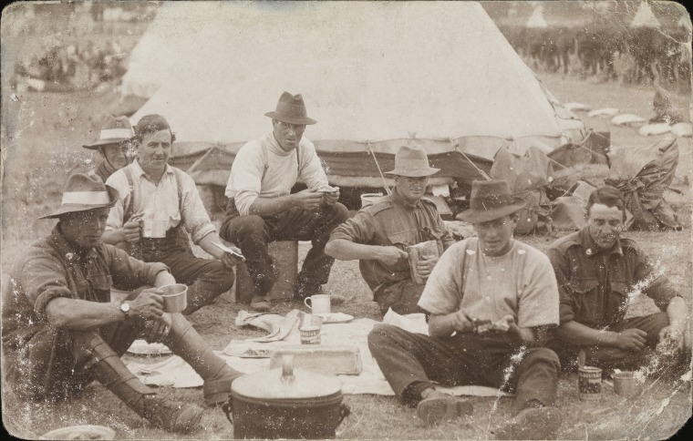 A group of soldiers eating a meal, possibly at Blackboy Hill Camp ...