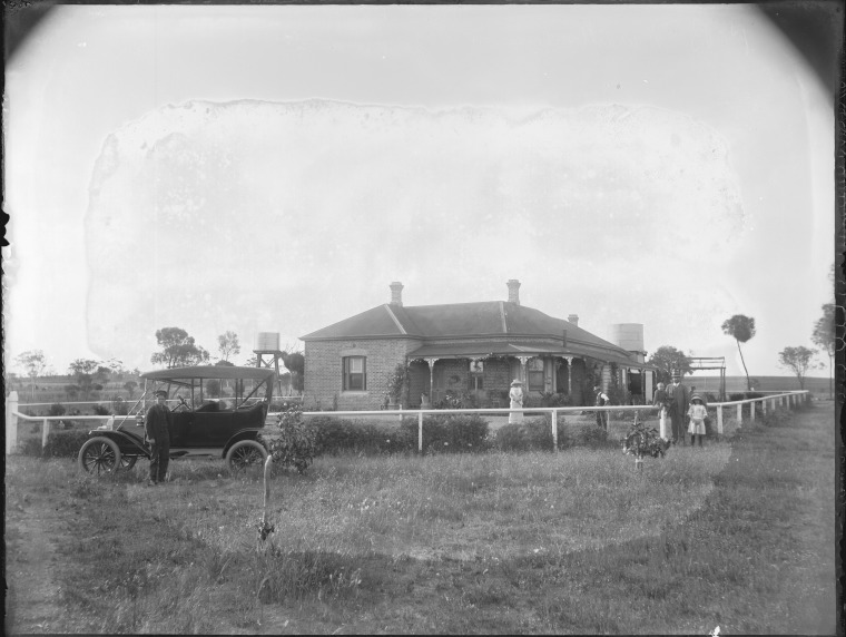 P.B. Durack and family outside their home in Wagin. - JPG 95.3 KB