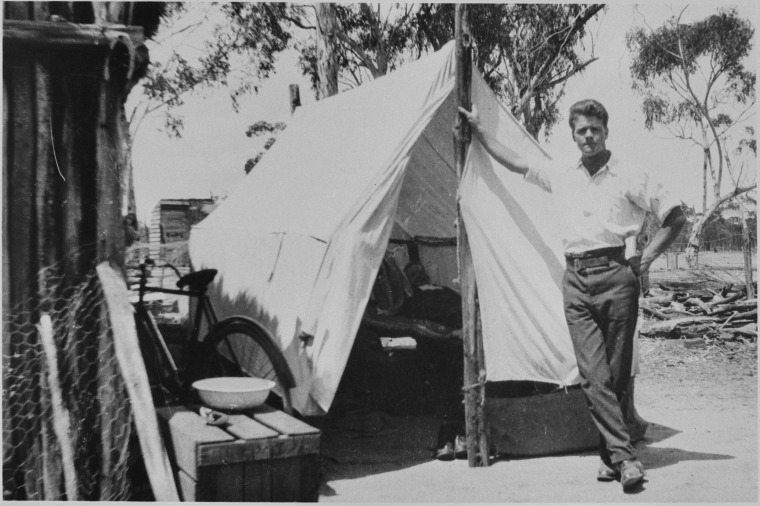 Frank Broomhall outside his tent pitched behind the Rowlands' Store at ...