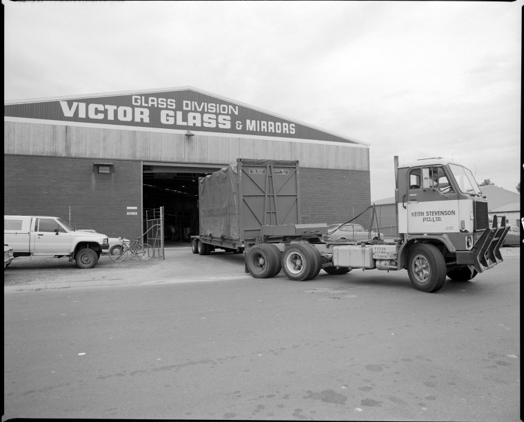 A Keith Stevenson Pty Ltd truck delivering to Victor Glass & Mirrors ...