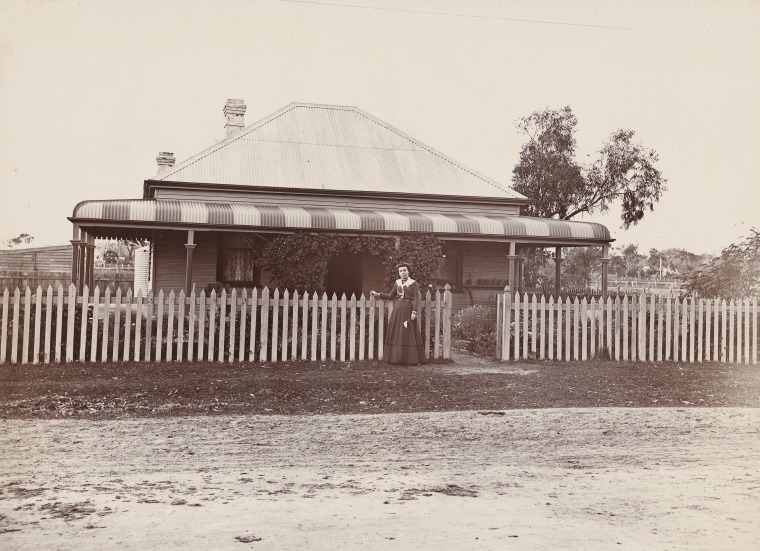 A woman and a man with a horse outside a house, probably in Roebourne ...