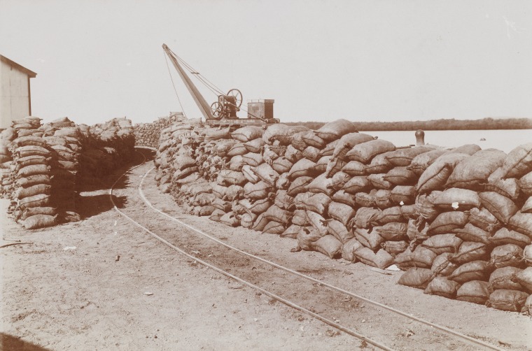 6,600 bags of copper ore awaiting shipment on the Cossack wharf. - JPG ...