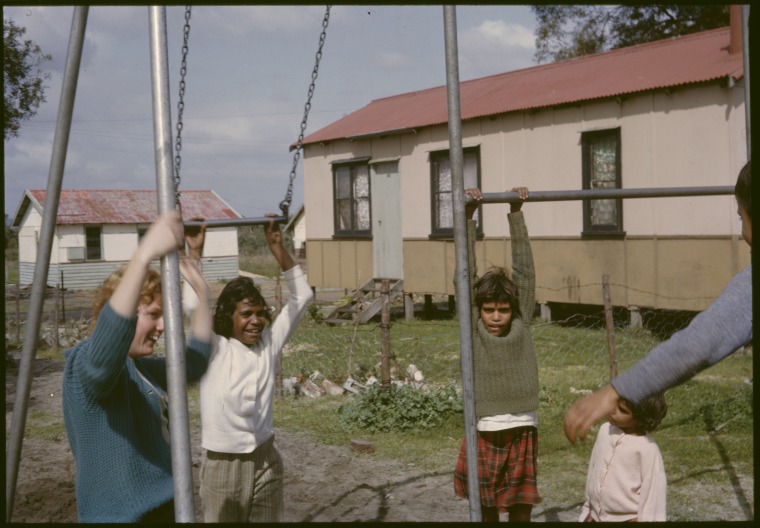 Children on play equipment at Allawah Grove. - JPG 101.2 KB