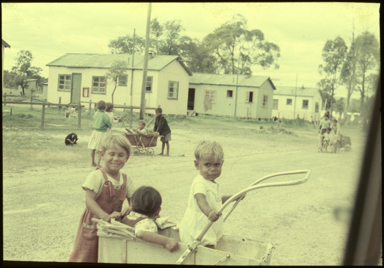 Children playing with prams at Allawah Grove. - JPG 103.3 KB