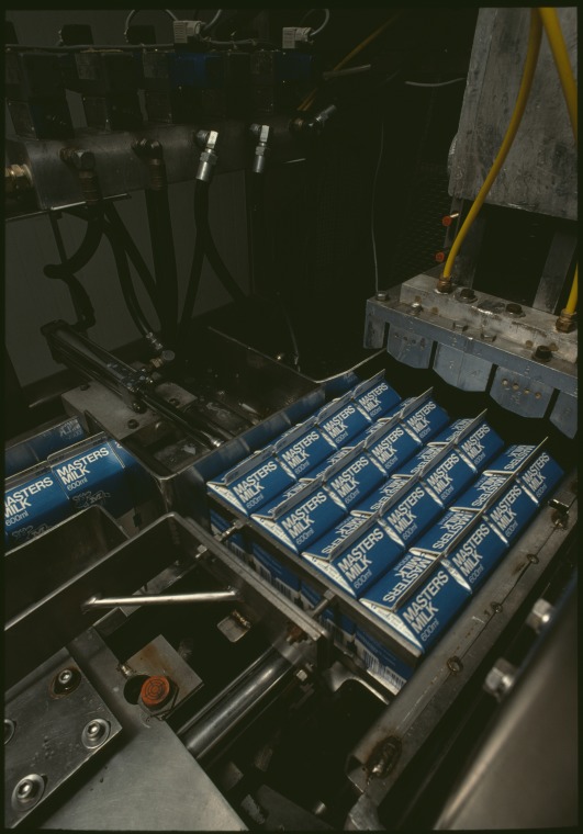 Working in Masters Dairy, Welshpool. - State Library of Western Australia