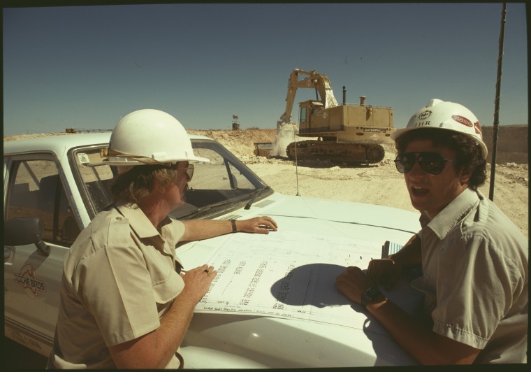 Surveyors working for Roche Brothers at an open cut gold mine in ...