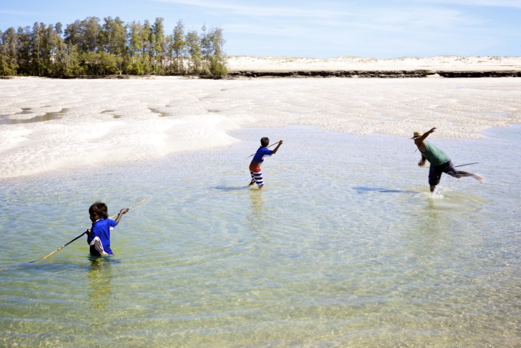 Hunting with spears along the coast at One Arm Point, 1 April 2013 ...