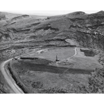 Aerial photograph of Mt Tom Price showing drill and shovel removing ...
