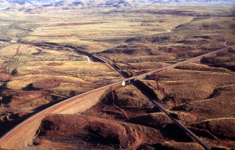 The Robe River Railway line crosses over the Hamersley Iron line ...