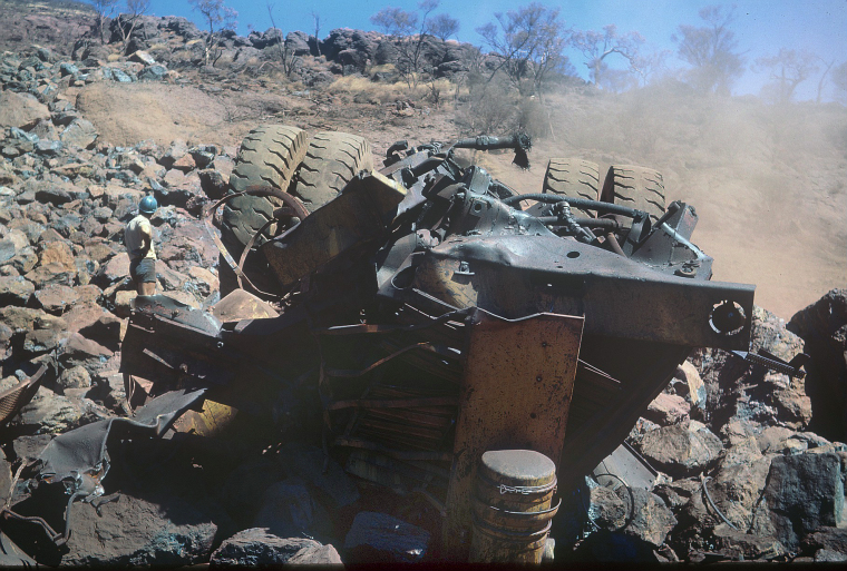 The wreck of a haul truck after an accident at Mt Tom Price. - JPG 455.6 KB