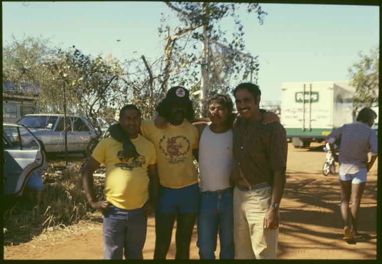 Ron Williams with three other Aboriginal men with a Peters Ice Cream ...