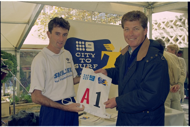 Ray Boyd is presented with his running singlet for the City to Surf ...