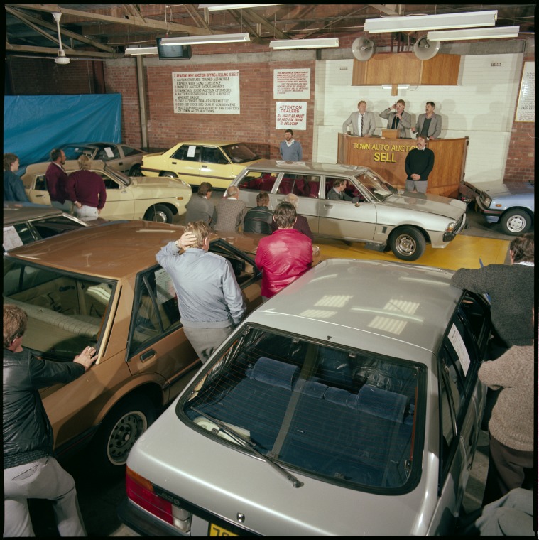 An auction underway at Town Auto Auctions, 48 Wellington Street, East ...