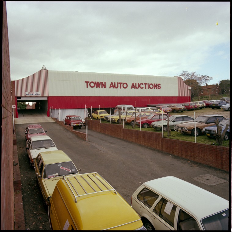 An auction underway at Town Auto Auctions, 48 Wellington Street, East ...