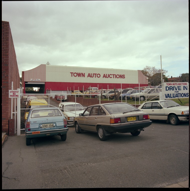 An auction underway at Town Auto Auctions, 48 Wellington Street, East ...