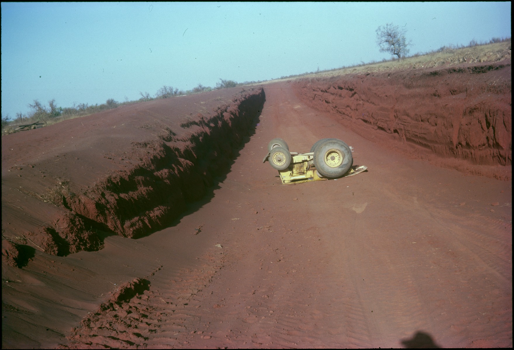 Overturned tractor duing roadworks on the Great Northern Highway on ...