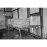 Bed with chains attached inside the police lock-up, Nullagine, Western ...