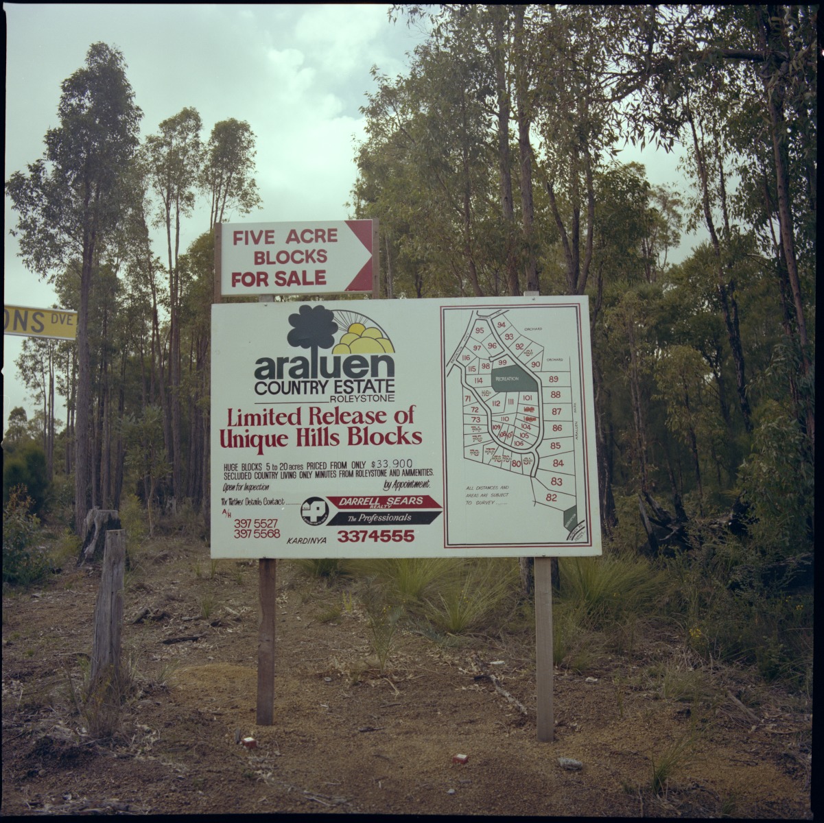 Sign including a map advertising the sale of real estate at Araluen ...