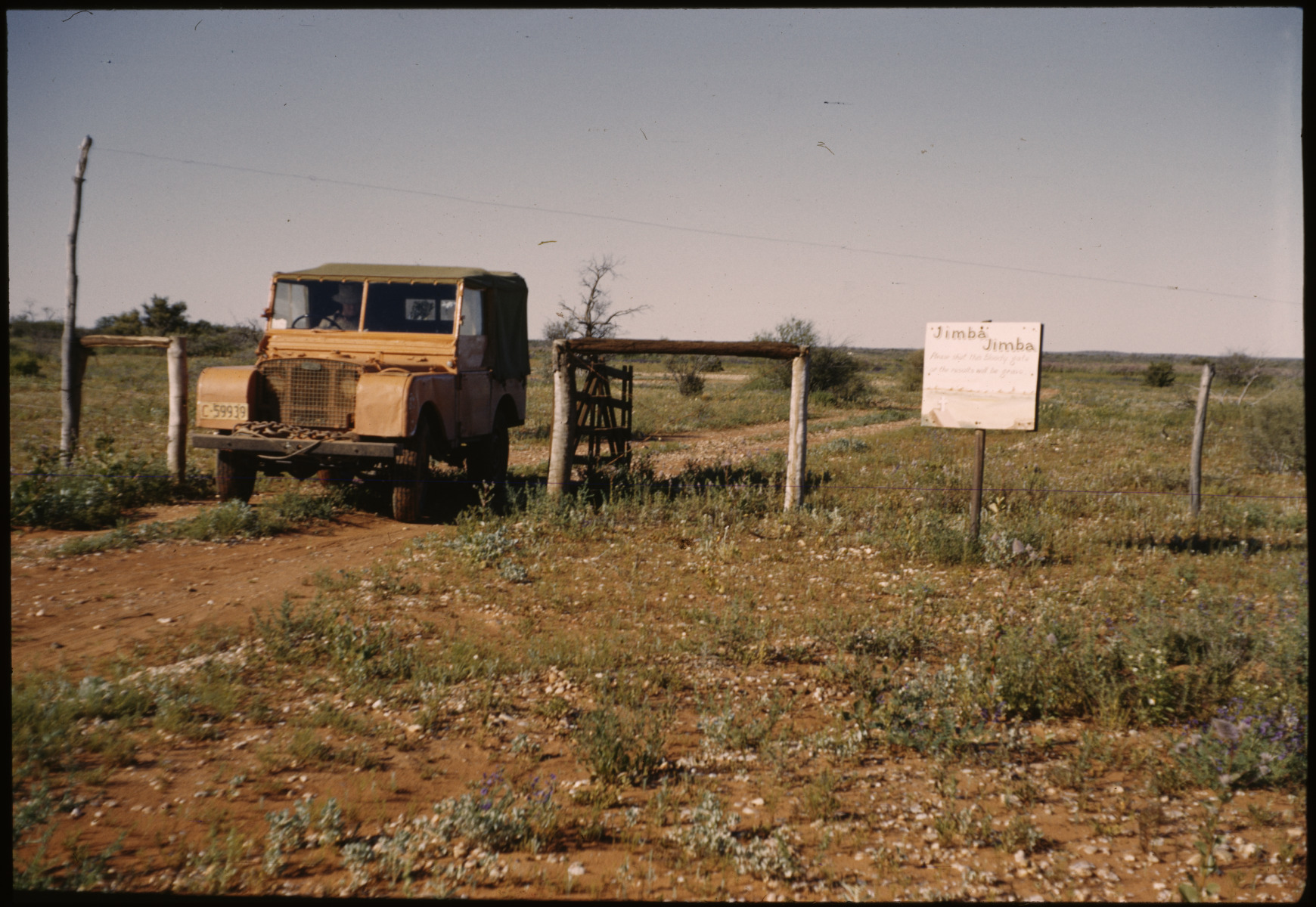 Gate and sign at entrance to Jimba Jimba Station, Western Australia ...