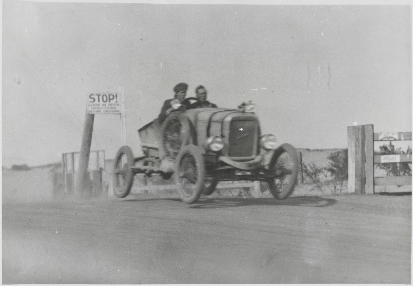 Len Hope and Alf Swarbrick speed across the Rivervale railway crossing ...