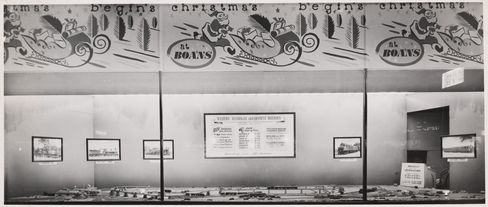 Window display of a model railway and an advertisement for Western ...